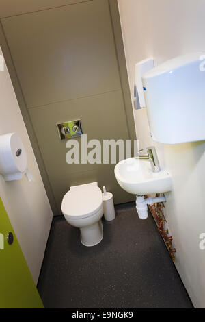 Wash basins, hand dryers and toilet cubicals of modern restroom Stock ...