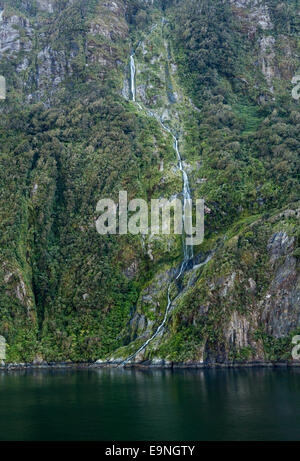 Spectacular waterfall in Milford Sound Fiordland National Park, New ...