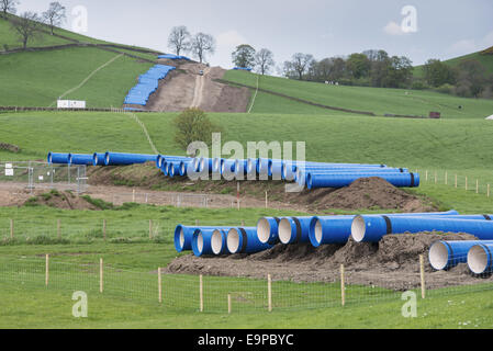 Industrial gas pipeline. Laying new pipes in field underground. Outdoor ...
