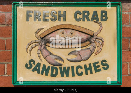 Fresh crab sandwiches sign on a wall Stock Photo - Alamy