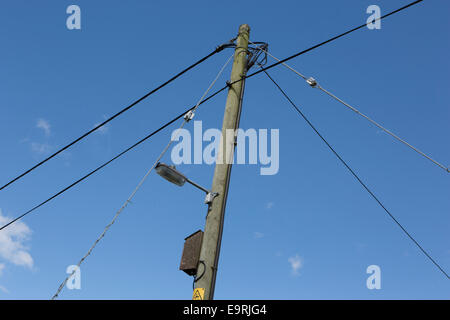 Wooden post for national electric grid with crossbars holding isolators ...