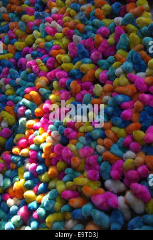 Multi-colored baby chicks in a metal cage Stock Photo - Alamy