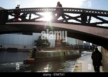 Canal boat passes under a bridge on the Trent and Mersey Canal near the ...
