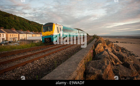 Arriva train approaching Ferryside Station on route to Carmarthen, west ...