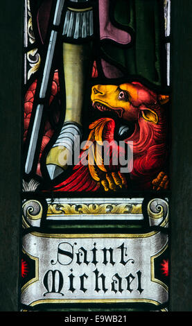Detail of St. Michael and the devil stained glass, St. Michael`s Church ...