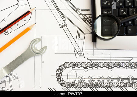 Magnifying glass, graph paper and keyboard on the table Stock Photo - Alamy