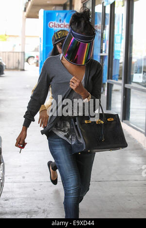 Vanessa Stiviano, seen in her trademark visor, goes to a nail salon in ...