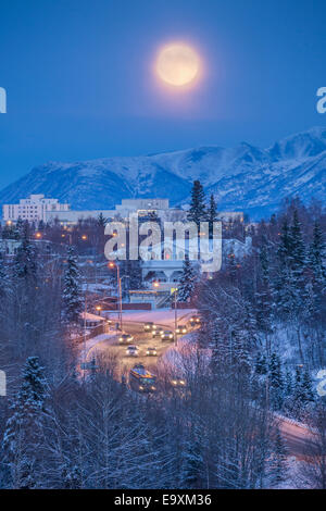 Night View Of The Anchorage Skyline With The Chugach Mountains In The ...