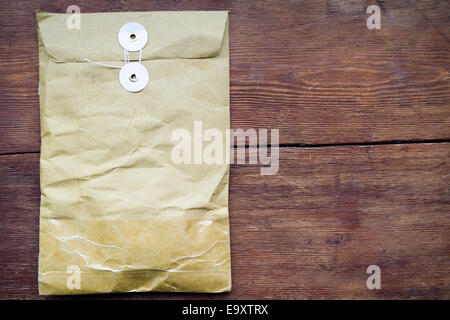 Vintage postal parcel on wooden table Stock Photo - Alamy