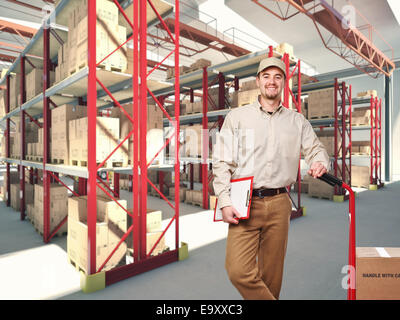 worker in a classic warehouse Stock Photo - Alamy