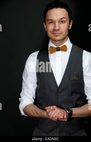 Male arm in suit and tie fill form clipped to pad Stock Photo - Alamy