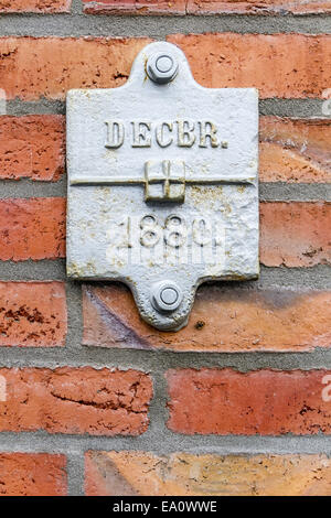 Water tide measurement sign in river during high tides and river ...