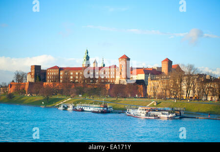 Beautiful sightseeing with Wawel Royal Castle and colorful flowers in ...