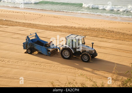 Seaside beach cleaning machine tractor pulled seen here in action in ...