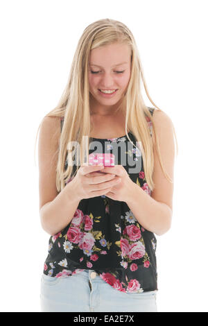 Teenager girl standing over pink background with hands together and ...