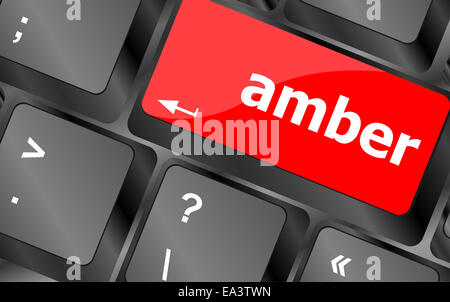 amber Button on Modern Computer Keyboard key Stock Photo - Alamy