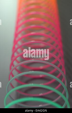 close-up of colorful slinky Stock Photo - Alamy
