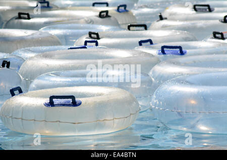 plastic floating tubes in a pool Stock Photo - Alamy