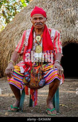Timorese men in traditional attire at Liurai Village; Timor-Leste Stock ...