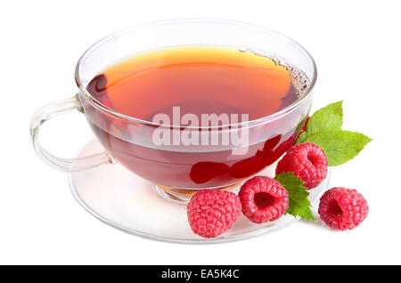 Black tea in cup with raspberries and blackberries on white background ...