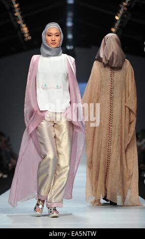 Jakarta, Indonesia. 7th Nov, 2014. A model presents a creation by ...