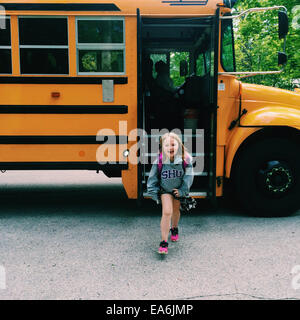 Children getting on school bus Stock Photo: 23367005 - Alamy