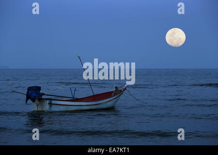 boat on sea night full moon Stock Photo - Alamy