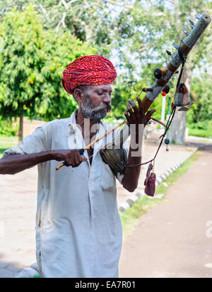 Old folk musician of Rajasthan playing Ravanhatha at Mador garden ...