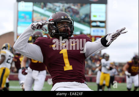 Minnesota wide receiver KJ Maye (1) and teammates stand during the ...