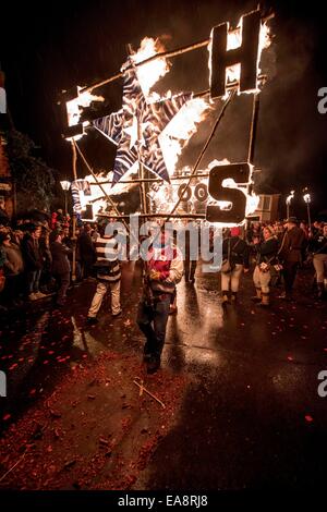 Bonfire procession for Remembrance. Spectators lined the streets of the ...