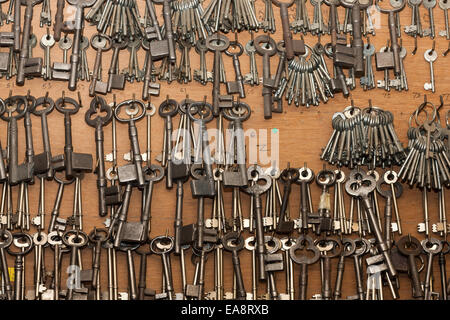 Blank keys hanging in a locksmith's shop Stock Photo - Alamy