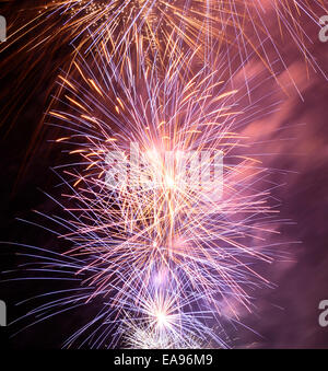 Close-up of a red fireworks display symbolizing New Year, celebration ...