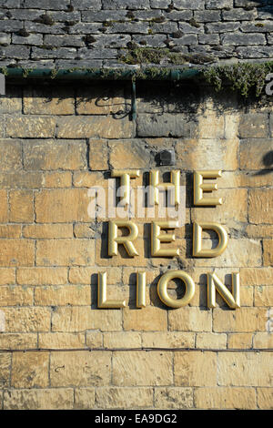 Red Lion pub sign and red letter box at Coleshill village ...