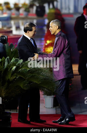 President Barack Obama, center, arrives with Maj. Gen. Bradley A ...