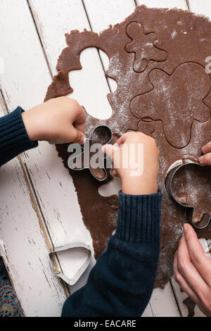Little boy making gingerbread men Stock Photo - Alamy