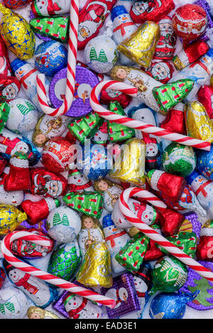 Assorted seasonal festive colourful chocolates sweets candy with shiny ...