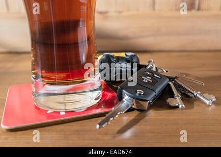 Car keys and a pint of beer Stock Photo - Alamy