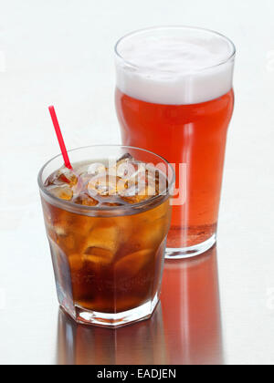 A pint of beer and a glass of cola Stock Photo - Alamy
