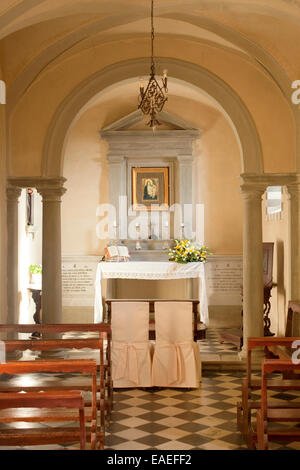 Church benches in the Catholic Church. Italy Stock Photo - Alamy
