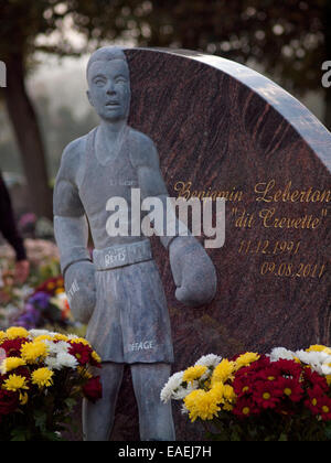 The carved gravestone of a young boxer in a cemetery in Abbeville ...