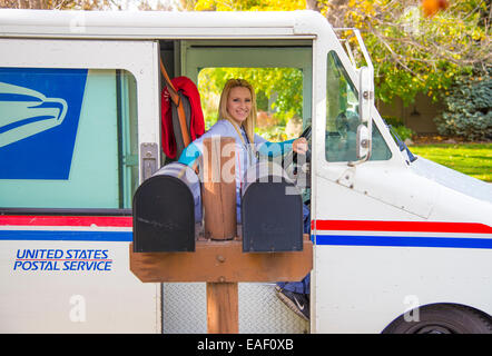 United States Postal Service delivery van parked on residential street ...