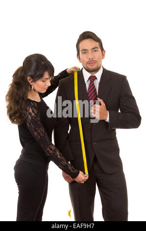 Hispanic young woman dressmaker designer using sewing machine smiling ...