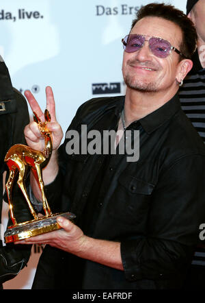 (dpa) - Bono, singer of the Irish rock band U2, smiles after his ...