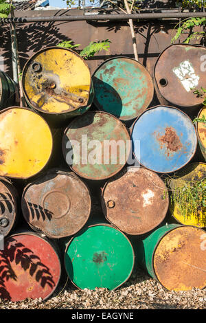 Old chemical barrels with flammable liquid warning label . Steel oil ...