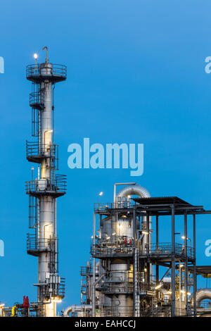 Detail of distillation towers in a chemical plant and refinery with ...
