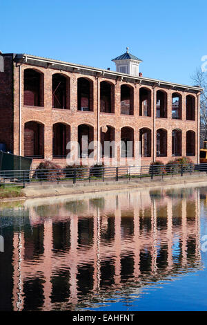 An old cotton mill converted into housing on the Leeds Liverpool Canal ...