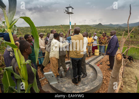Community members in Sukuroi village, Bukwo District, Uganda work to ...