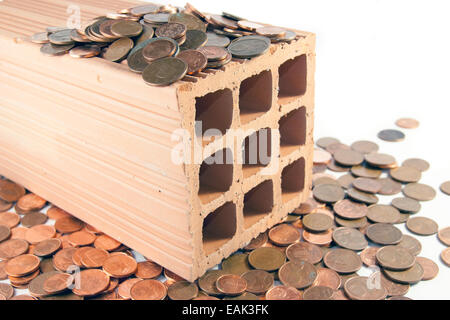 brick laying on euro coins Stock Photo - Alamy