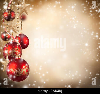 Gold christmas balls on a Christmas theme background Stock Photo - Alamy