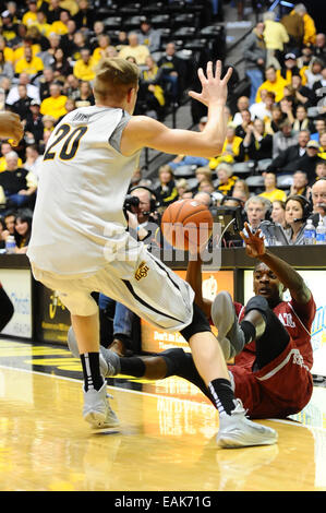 November 14,2014: New Mexico State Aggies guard Ian Baker (4) goes up ...